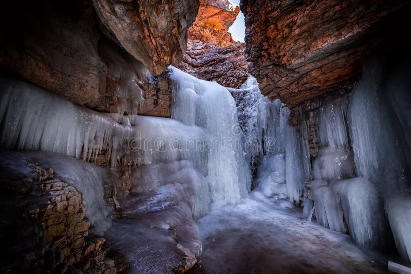 Frozen Waterfall in Mountain Gorge Stock Photo - Image of cliff, flow ...