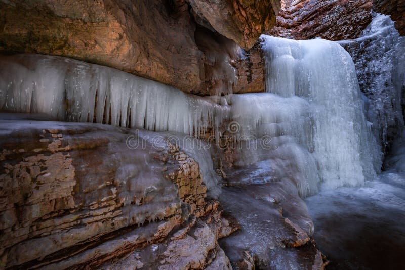 Frozen Waterfall in Mountain Gorge Stock Photo - Image of cliff, flow ...