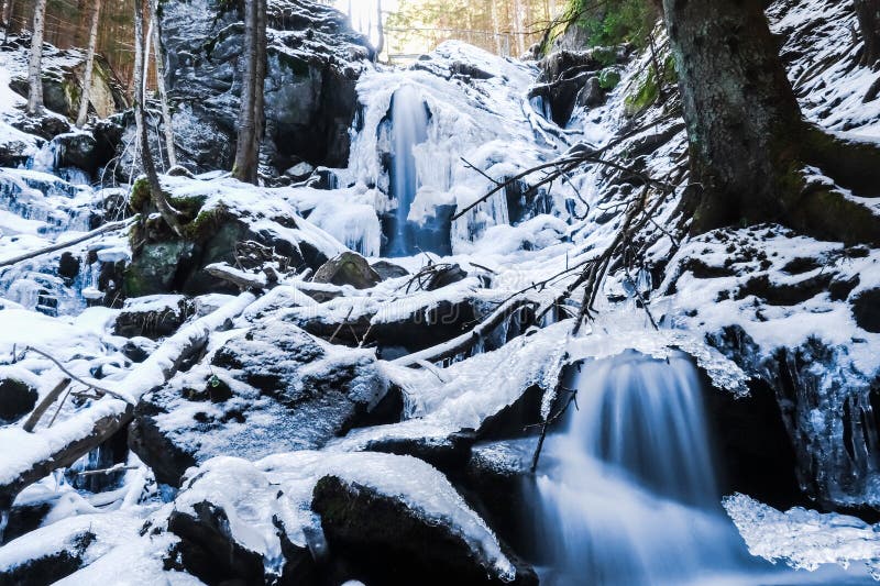 Frozen Waterfalls with Ice and Snow in the Forest Stock Image - Image ...