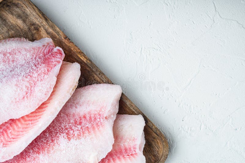 Frozen White Fish Fillet, on White Background, Top View with Copy Space ...