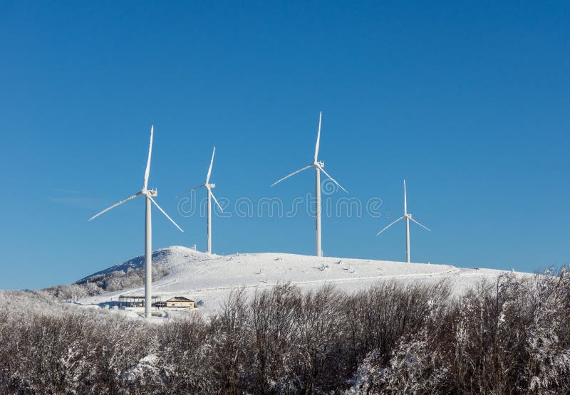 Frozen wind turbines stock photo. Image of turbine, snow - 175815202