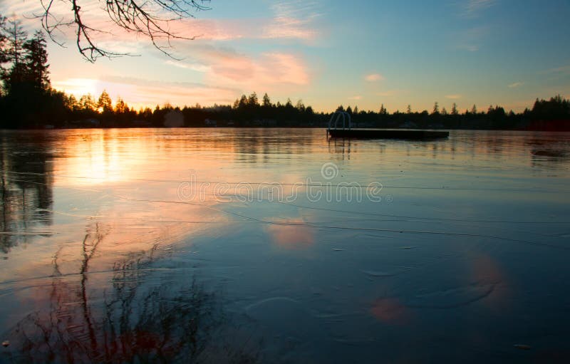 Frozen Winter Lake at Sunset Stock Photo - Image of sunset, golden ...