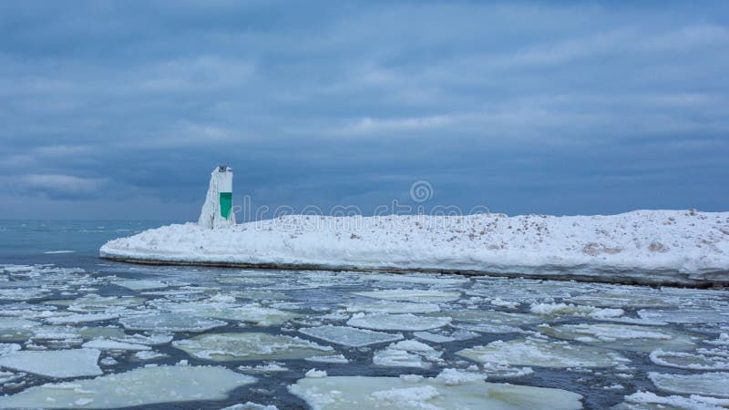 Frozen Winter Lighthouse stock photo. Image of pier, lighthouse - 49666822