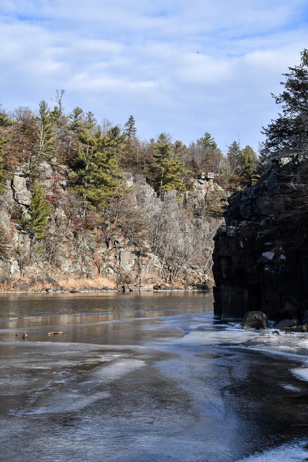 Frozen Wintry Waters of the River Along the Rocky Cliffs in Wisconsin ...