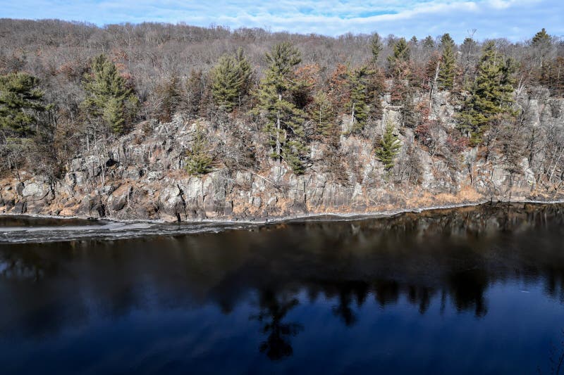 Frozen Wintry Waters of the River Along the Rocky Cliffs in Wisconsin ...