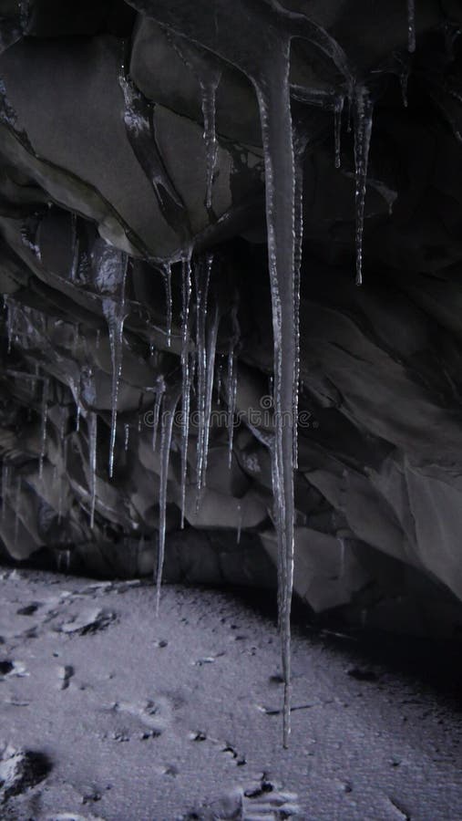 Frozen Wonders of Reynisfjara – a Cave of Ice and Shadow Stock Image ...
