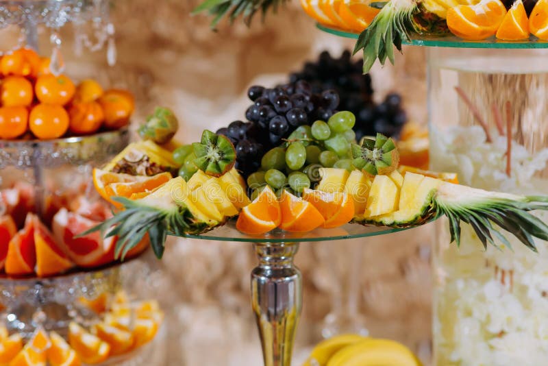 Fruit Bar. Table with Fruits, Bananas, Grapes. Orange and Pineapple ...