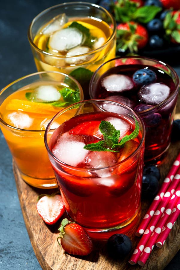 Fruit and Berry Beverages with Ice in Assortment, Vertical Top View ...