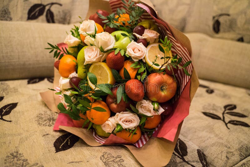 Fruit and Berry Bouquet with Roses in a Package Stock Image - Image of ...