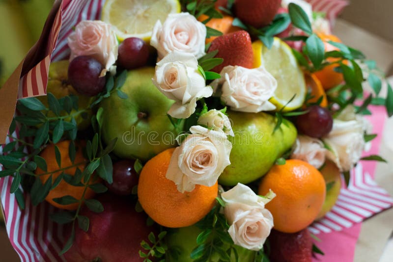 Fruit and Berry Bouquet with Roses in a Package Stock Image - Image of ...