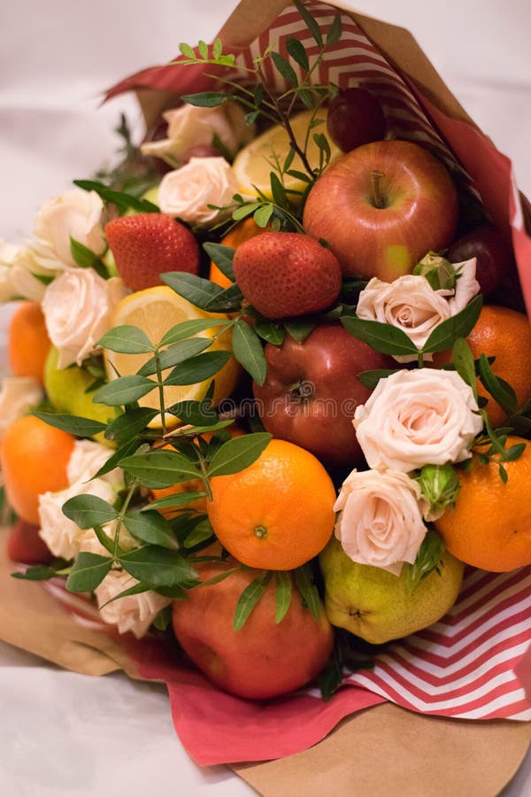 Fruit and Berry Bouquet with Roses in a Package Stock Photo - Image of ...