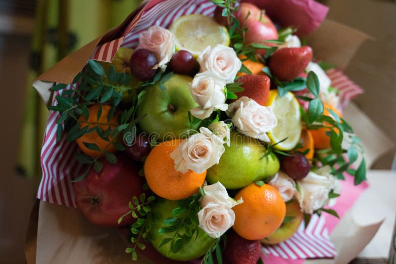 Fruit and Berry Bouquet with Roses in a Package Stock Photo - Image of ...