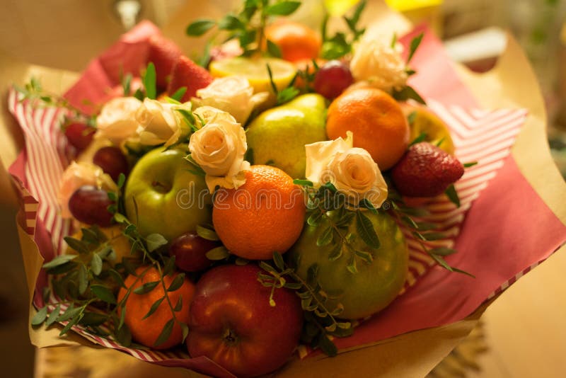 Fruit and Berry Bouquet with Roses in a Package Stock Photo - Image of ...