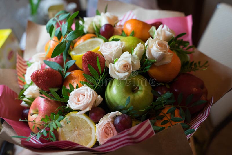 Fruit and Berry Bouquet with Roses in a Package Stock Photo - Image of ...