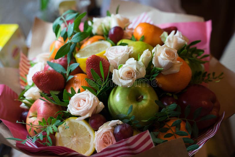 Fruit and Berry Bouquet with Roses in a Package Stock Image - Image of ...