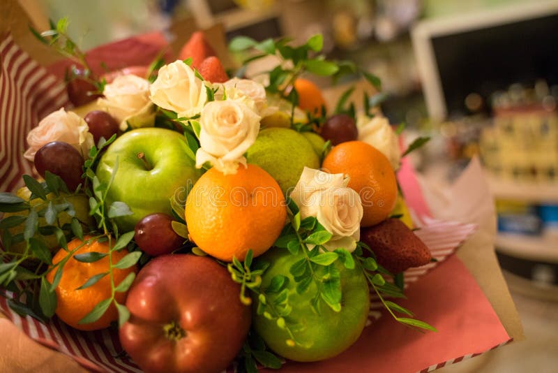 Fruit and Berry Bouquet with Roses in a Package Stock Image - Image of ...