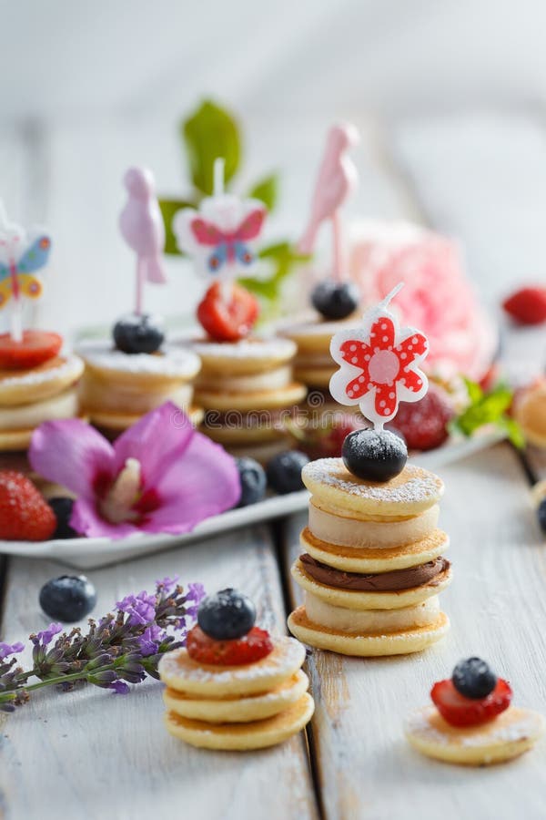 Fruit, Berry and Pancake Canapes on White Wooden Table Stock Image ...