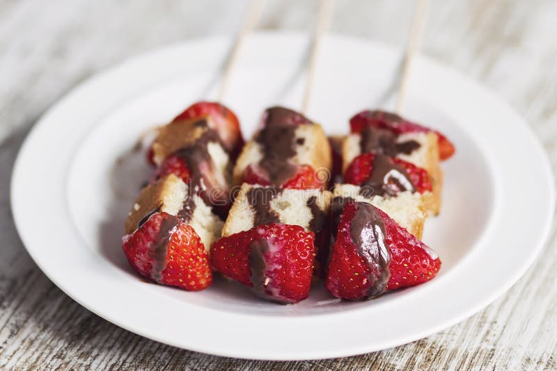 Fruit and cake skewers stock photo. Image of homemade - 132289940