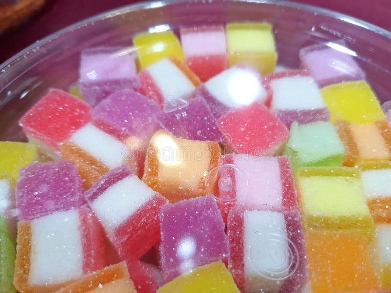 Fruit candy in plastic box stock photo. Image of store - 240316630