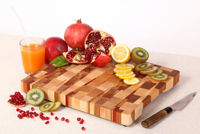 Fruit on a chopping board stock image. Image of wooden - 55720073