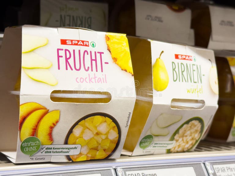 Fruit Cocktail and Pear Cube Packaged Snacks on Store Shelf Editorial ...