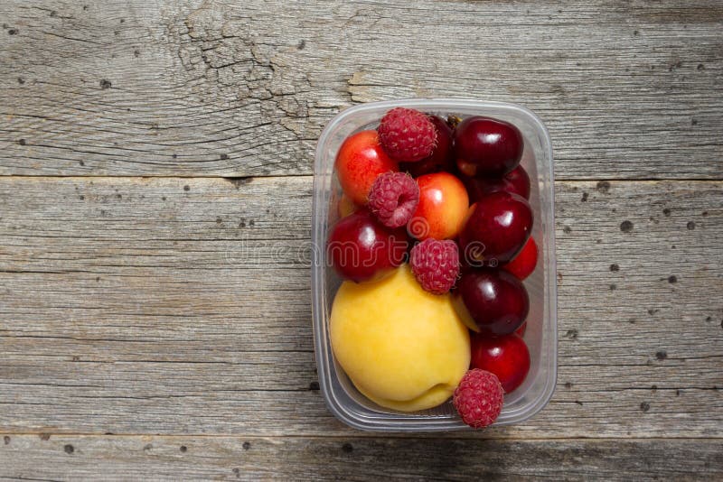 Fruit in Containers on a Wooden Table. Healthy Food Stock Photo - Image ...