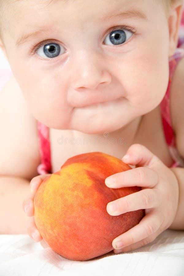 Girl eating big peach stock photo. Image of youth, temptation - 2701460