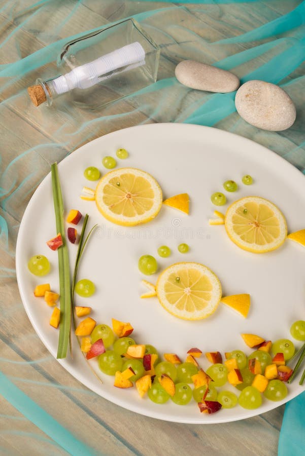 Fruit fish stock photo. Image of cuisine, lemon, plate - 44265144