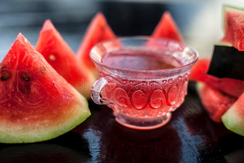 Ice Tea of Watermelon Seeds in a Transparent Glass Cup on Wooden ...