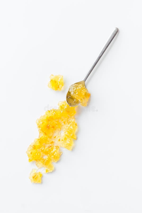 Fruit Jam. Yellow Dessert Smashed by Spoon on White Desk Stock Image ...