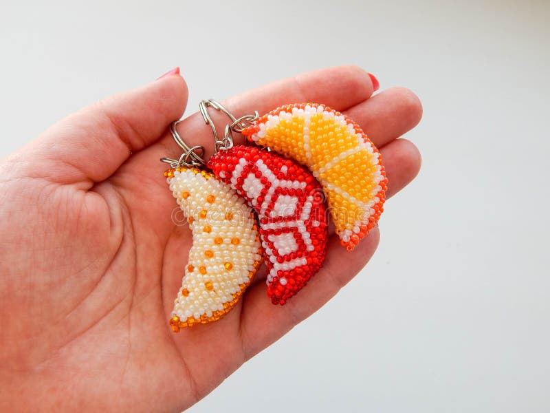 Fruit Keychains in a Female Hand Stock Image - Image of gift, beautiful ...