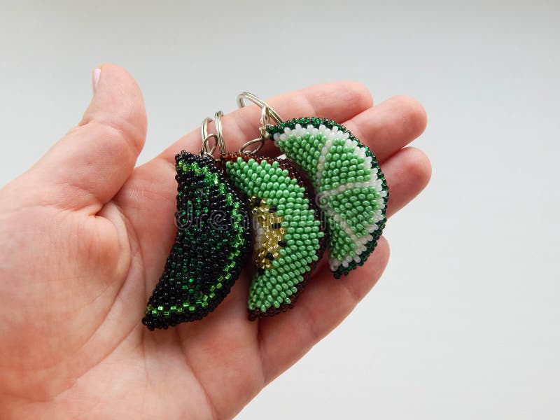 Fruit Keychains in a Female Hand Stock Photo - Image of keychain ...