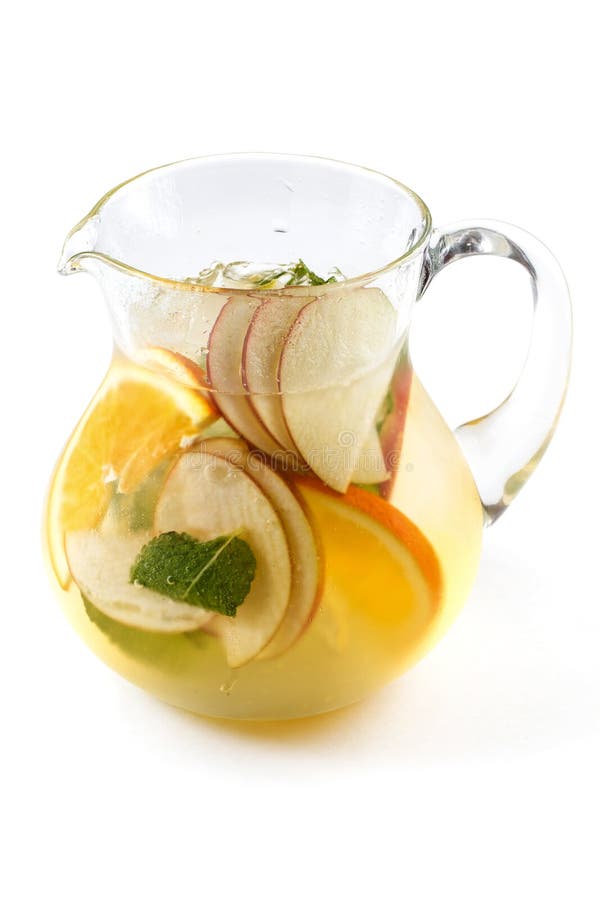 Fruit Lemonade with Slices of Apples and Oranges in a Jug on an ...