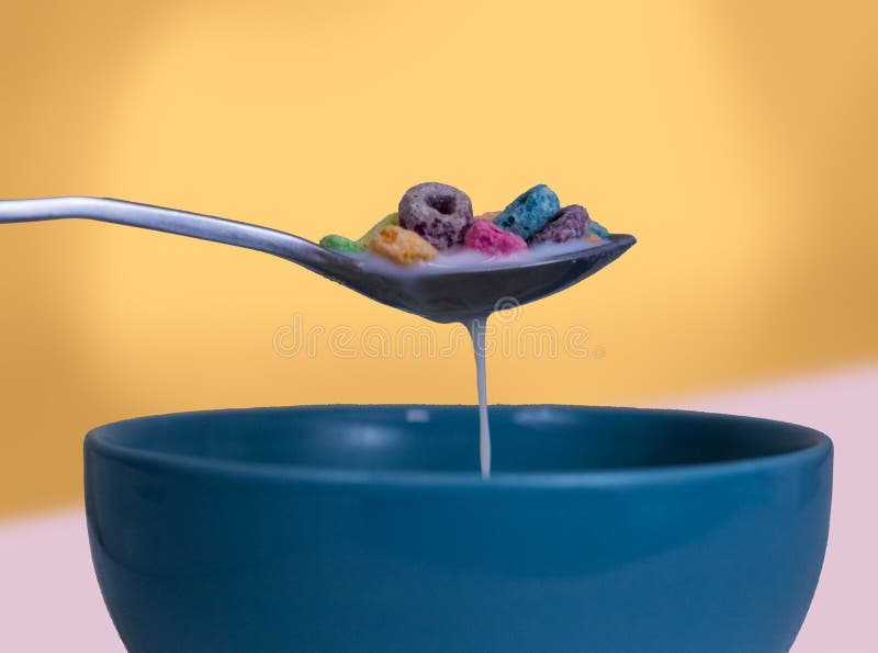 Fruit Cereal in Spoon Dripping Milk Stock Image - Image of play, spoon ...