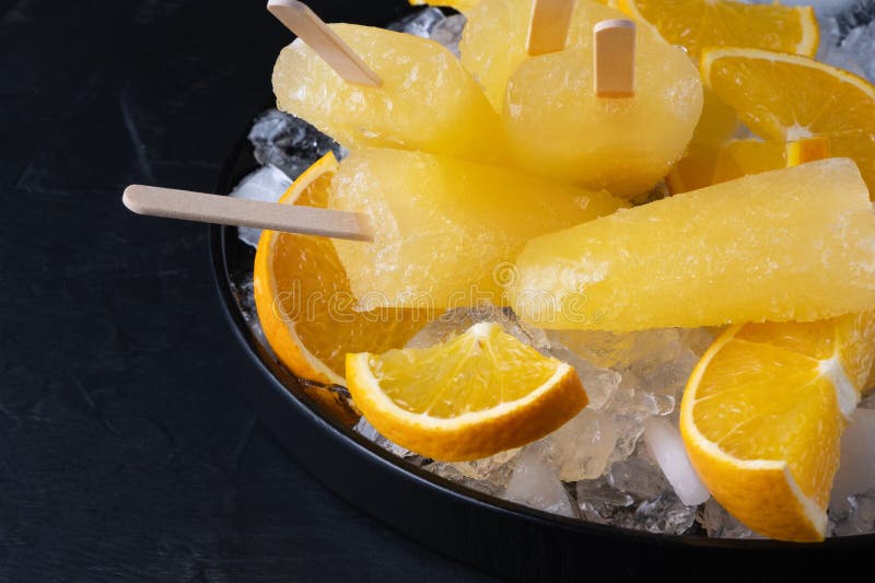 Fruit Orange Ice Lolly on Ice Cubes Stock Image - Image of cool, plate ...
