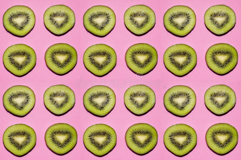 Fruit Pattern. Slices of Kiwi Fruit on Pink Background Stock Image ...