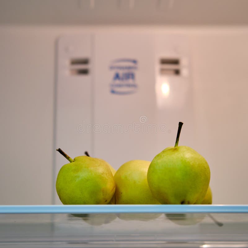 Fruit Pears on a Shelf in an Empty White Refrigerator Stock Photo ...
