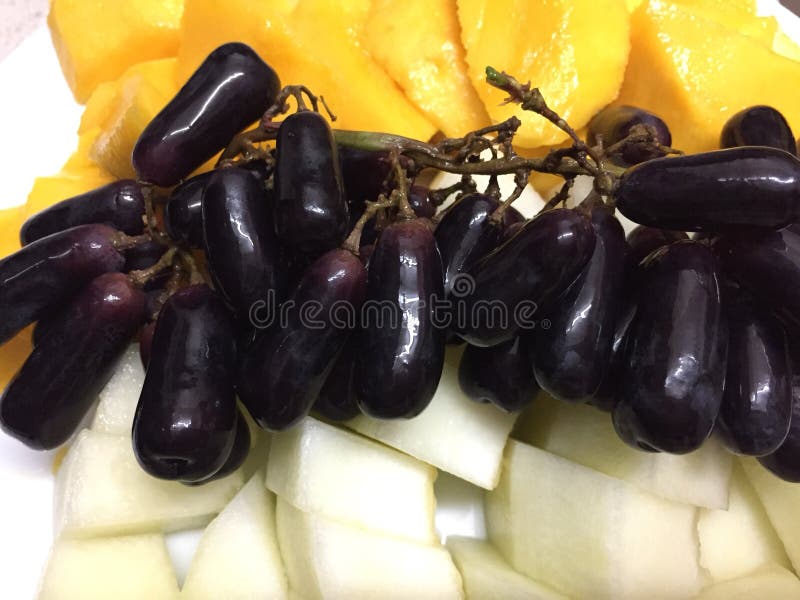 Fruit platter stock photo. Image of mango, grapes, platter - 113686008
