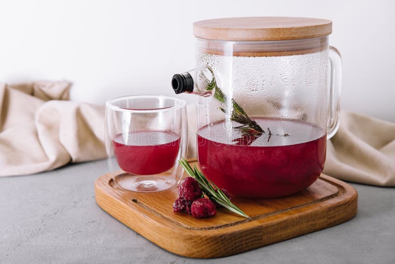Fruit Raspberry Tea in Glass Teapot and Cup Stock Image - Image of ...