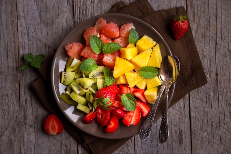 Fruit Salad with Cut Fresh Fruit and Mint Stock Photo - Image of wooden ...