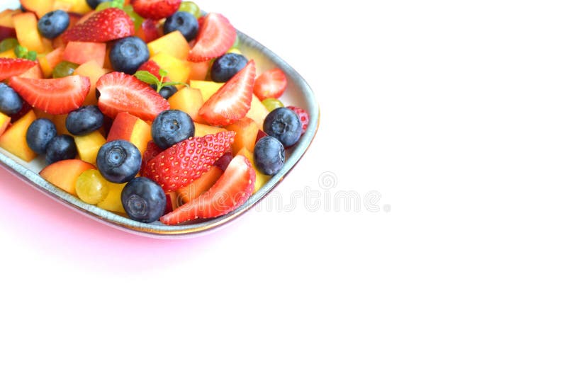 Fruit Salad in a Rectangular Plate on a White Background. Sliced ...