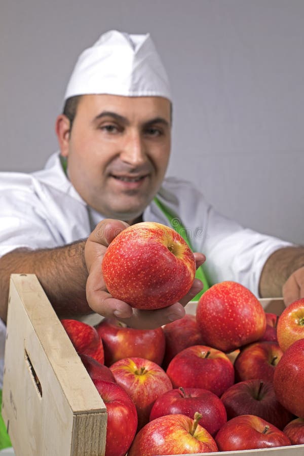 Fruit Seller with Box of Apples Stock Photo - Image of apples, market ...