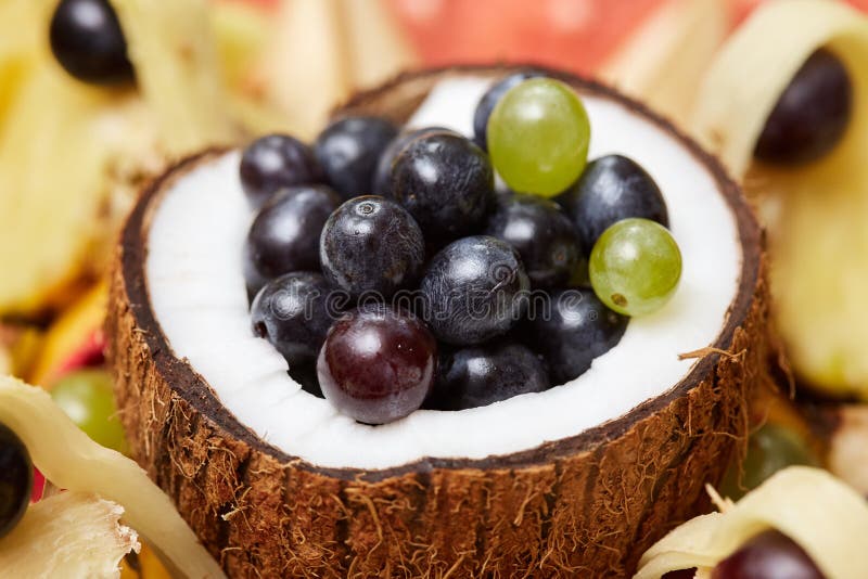 Coconut and grapes. stock image. Image of isolated, clipping - 135262781