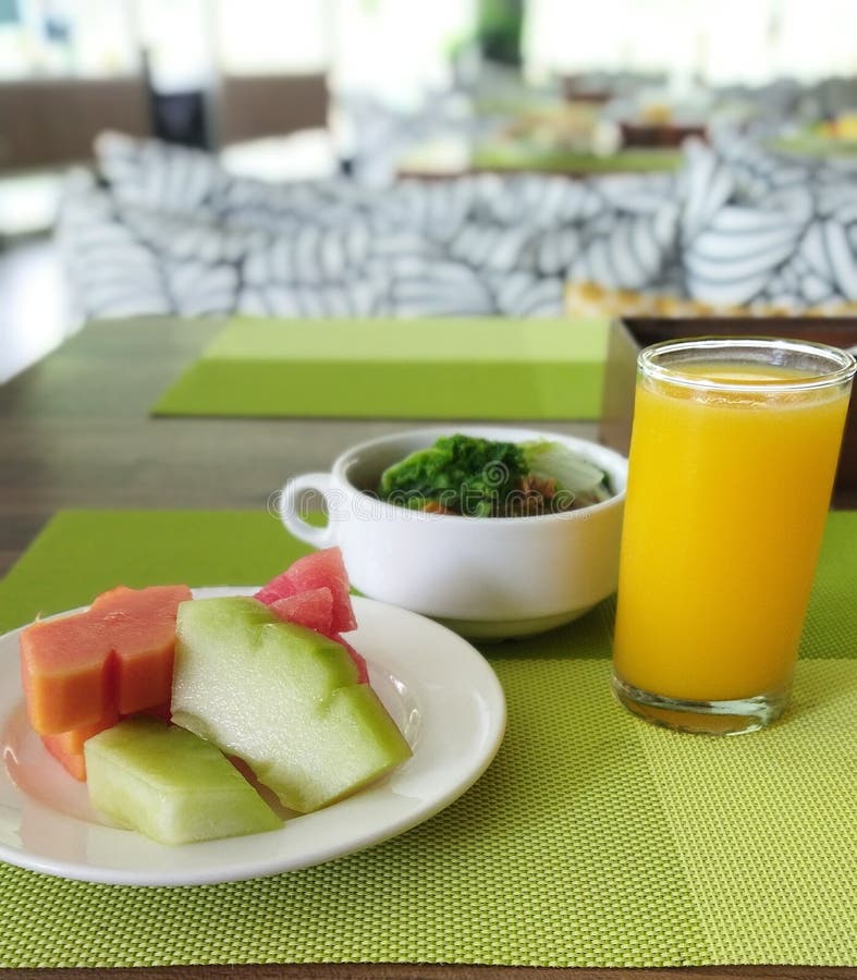 Fruit slice and orange jus stock image. Image of pawpaw - 291600421