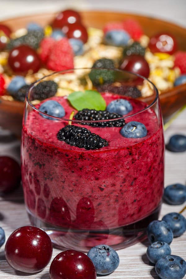 Fruit smoothie and muesli stock photo. Image of blend - 155604132
