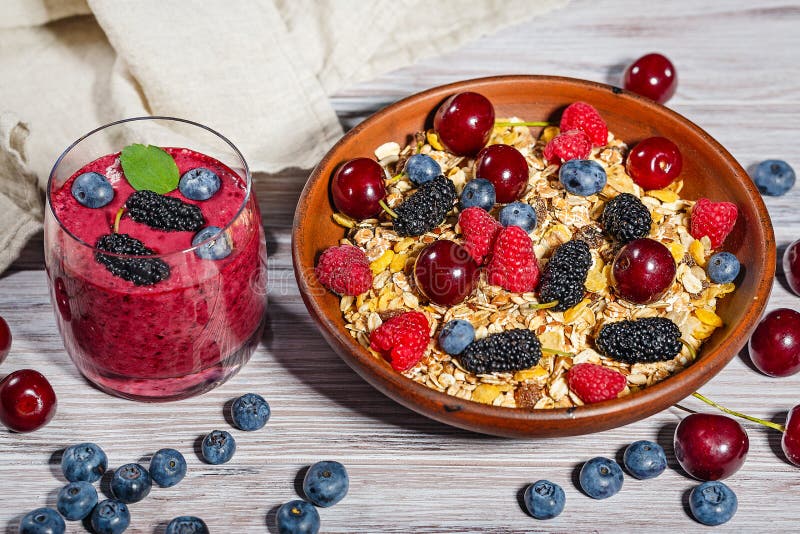 Fruit smoothie and muesli stock image. Image of muesli - 155604229