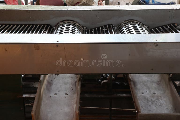 Fruit sort sizing machine stock image. Image of fruits - 118156139