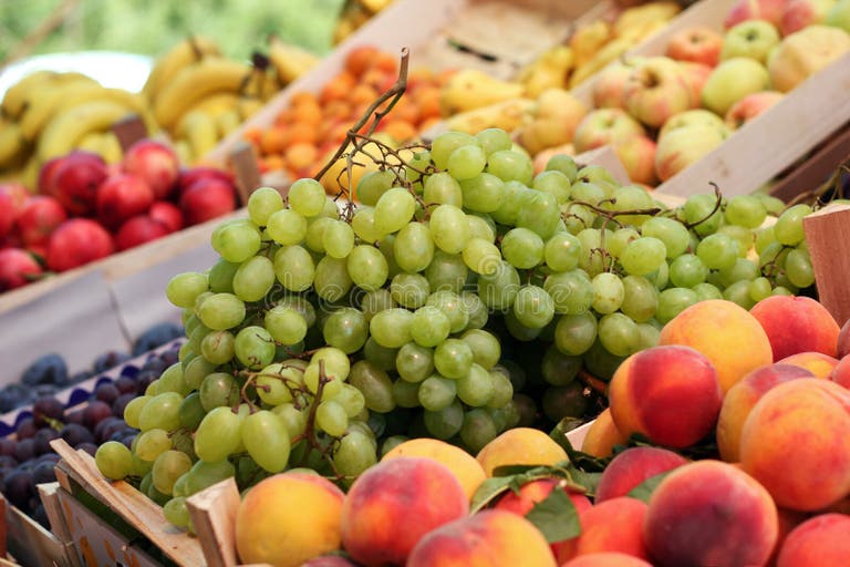 Fruit Stand with Grapes in Market Stock Image - Image of eating, buyer ...