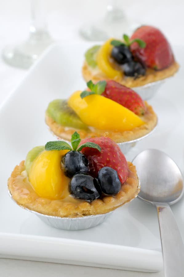 Fruit tartlets stock image. Image of macro, kiwi, spoon - 7589003