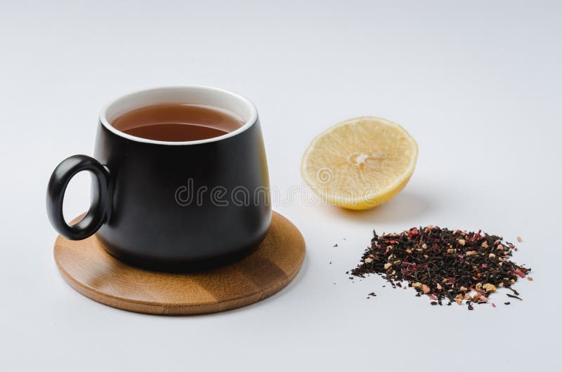 Lemon segment in a tea cup stock image. Image of plant - 13073999